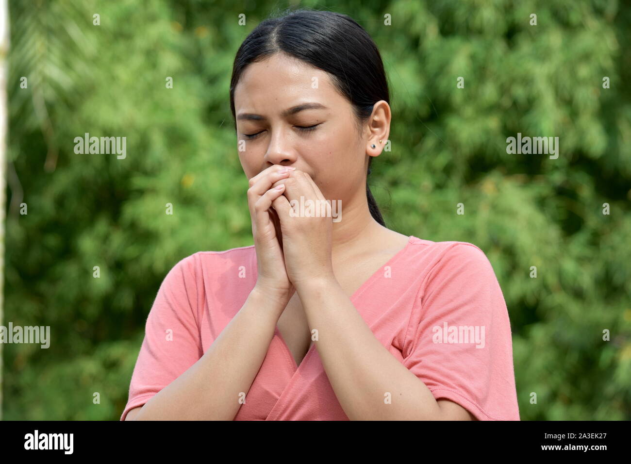 A Worried Diverse Woman Stock Photo - Alamy