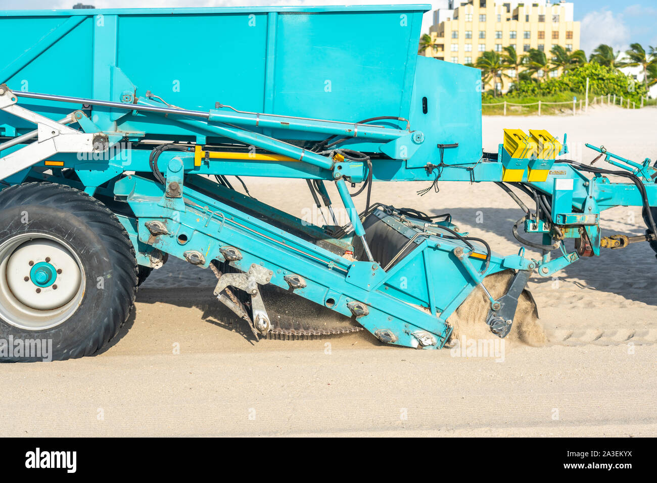 Tractor cleaning sand in South beach in Miami USA Stock Photo - Alamy