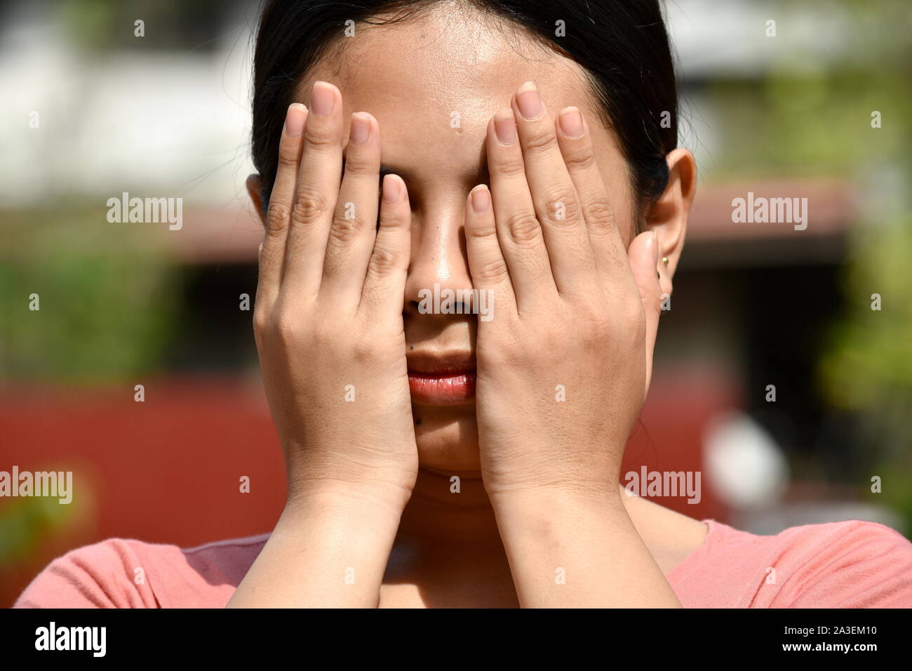 A Disappointed Beautiful Filipina Female Woman Stock Photo - Alamy