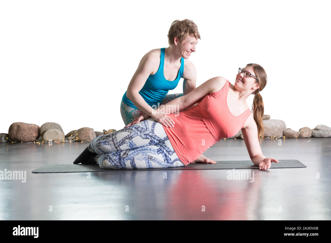 Personal trainer coaching a woman client Stock Photo - Alamy