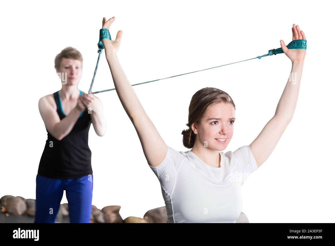 Personal trainer coaching a woman client Stock Photo - Alamy