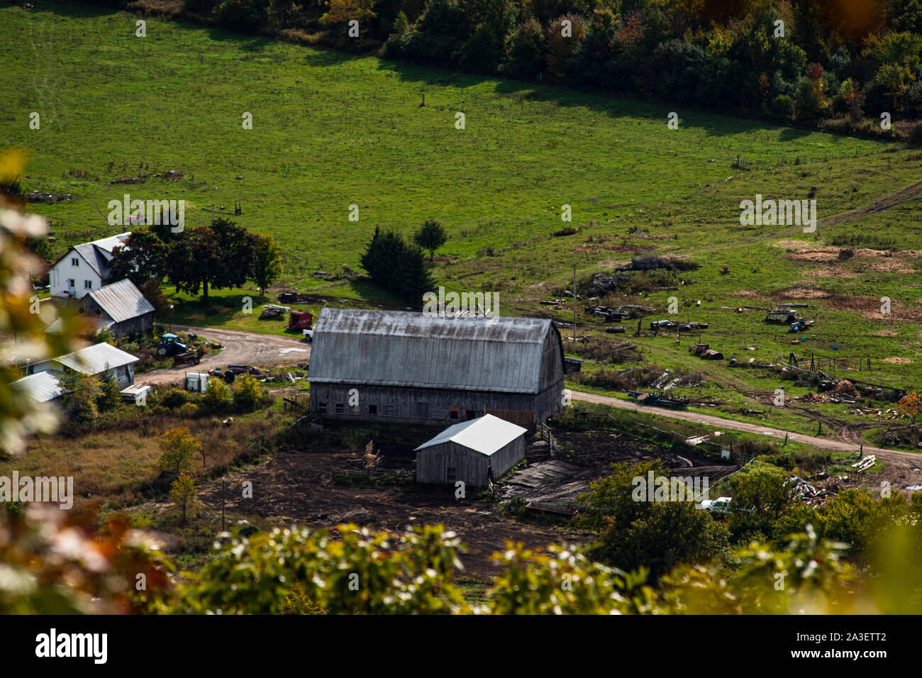 Top view of old barn and farm seen from top of mountain, Quebec, canada ...