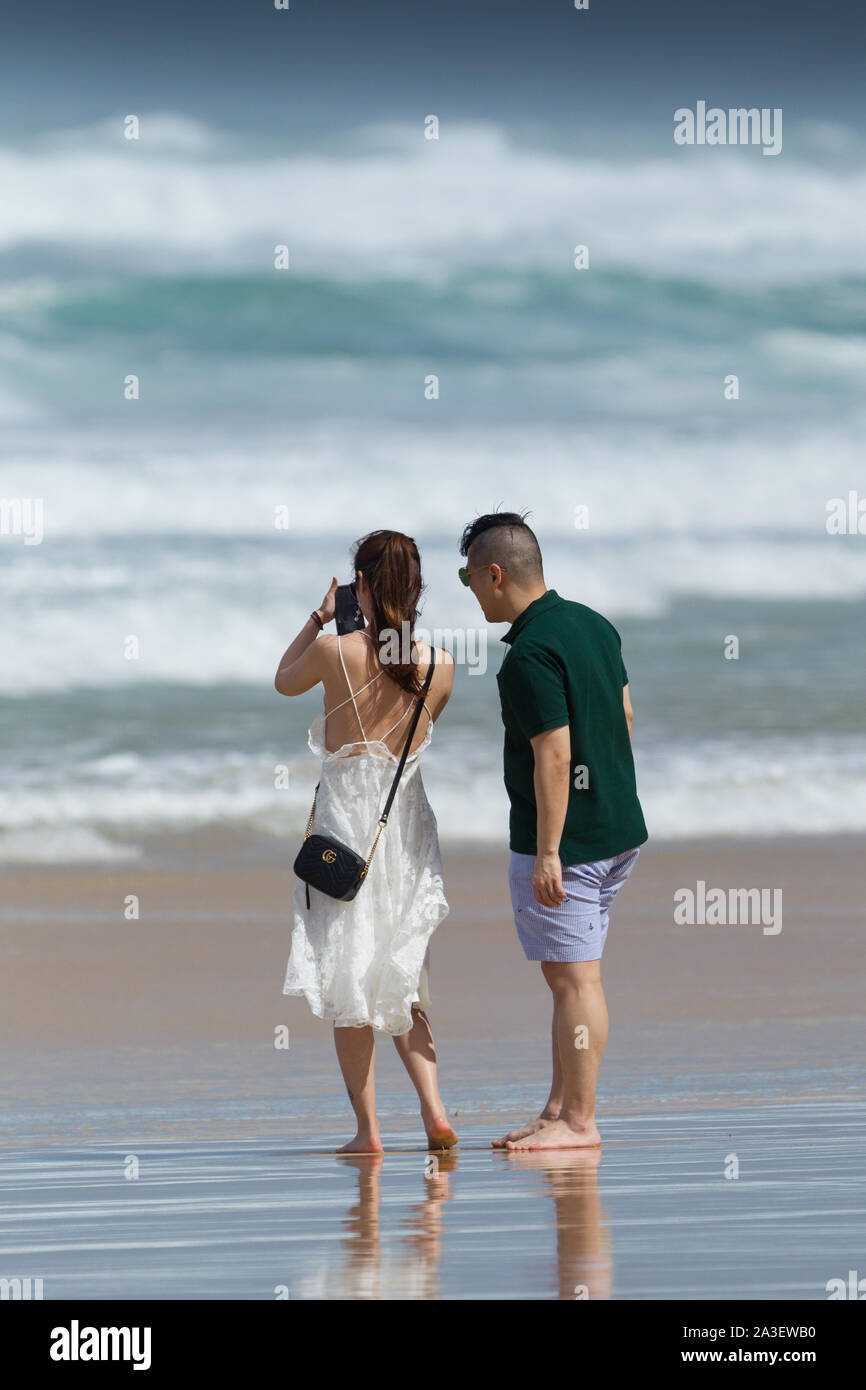 The normally-crowded and popular Surfers Paradise beach in Queensland ...