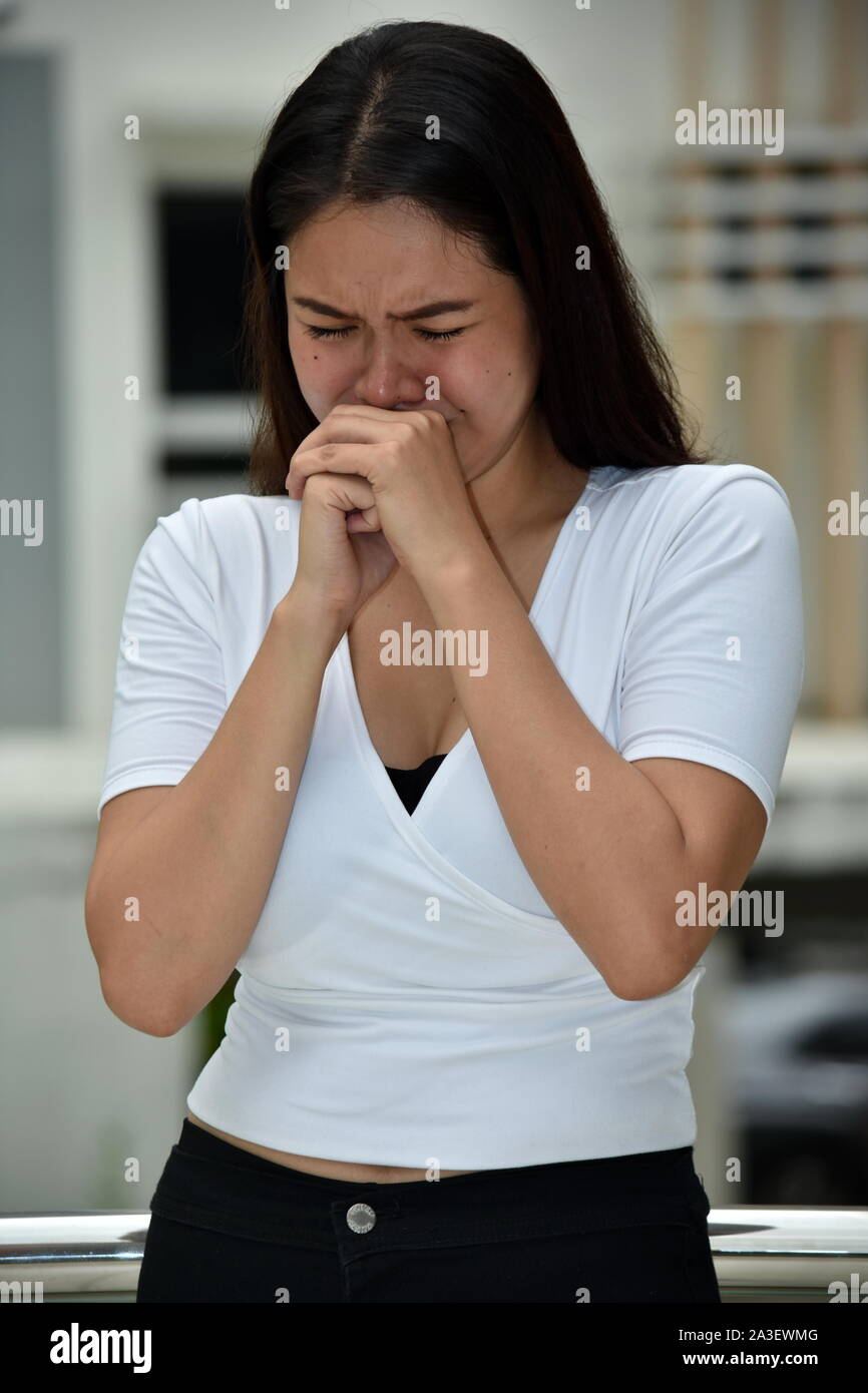 A Tearful Youthful Filipina Female Stock Photo - Alamy