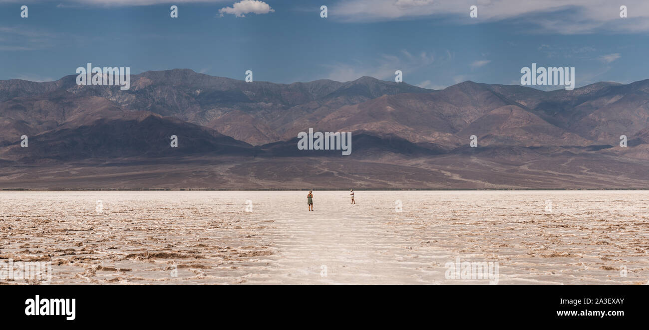 DEATH VALLEY USA AUGUST 7 2019: Tourists at Badwater desert Stock Photo ...
