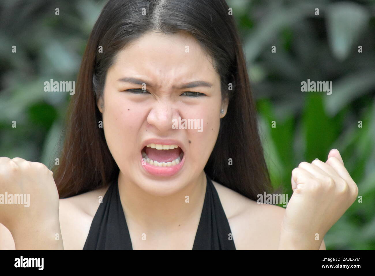 A Diverse Female Under Stress Stock Photo - Alamy