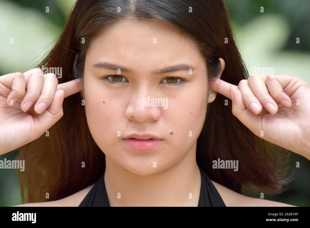 A Quiet Adult Female Stock Photo - Alamy