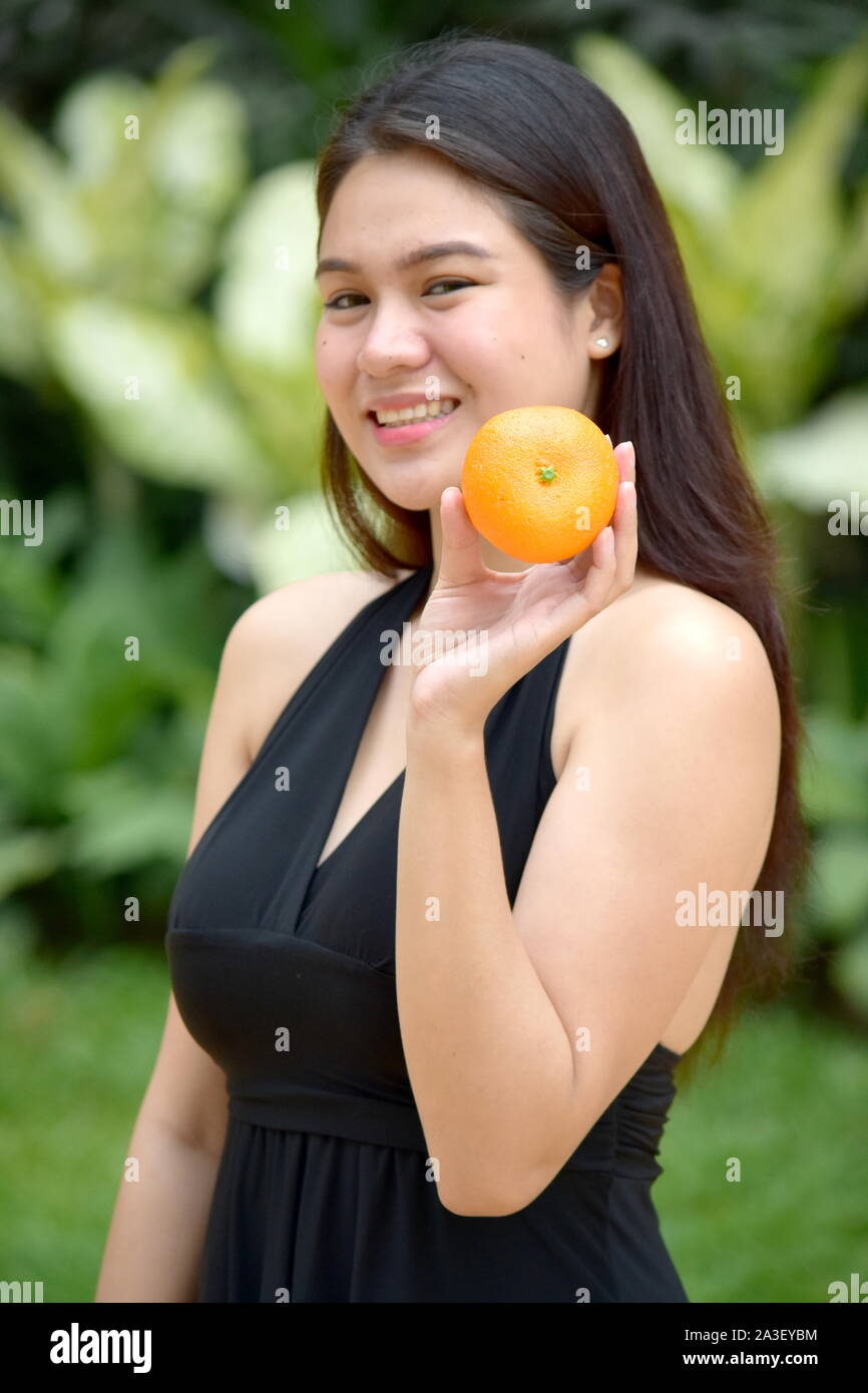 Beautiful woman looking fruit hi-res stock photography and images - Alamy