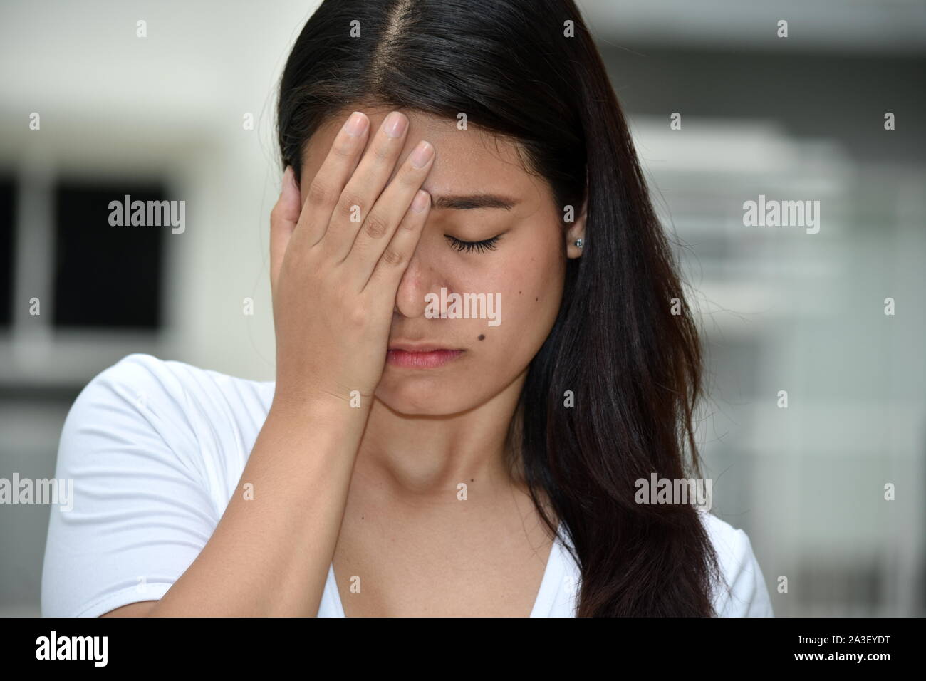 An Ashamed Adult Female Stock Photo - Alamy
