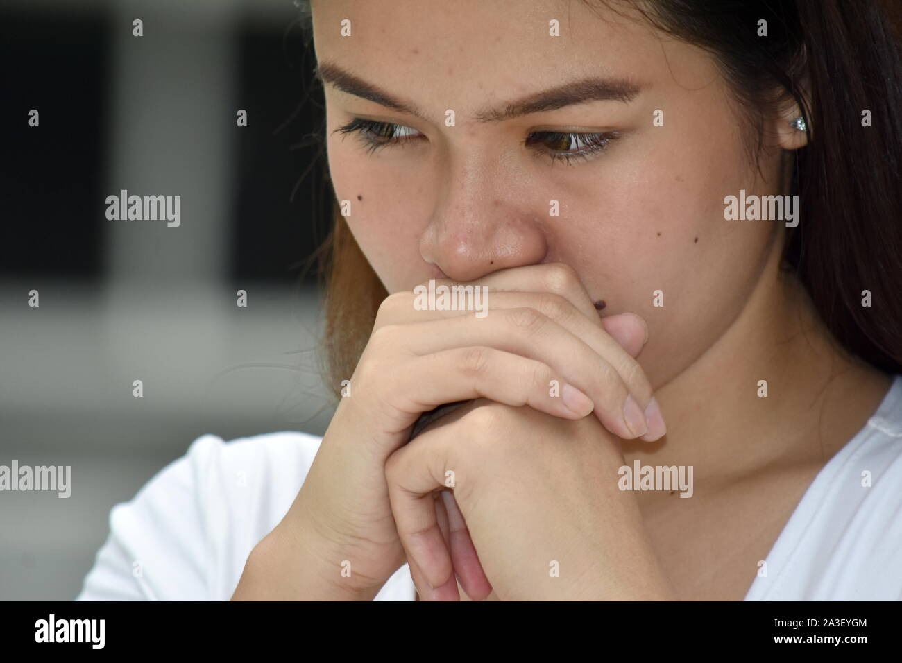 An Attractive Female And Worry Stock Photo - Alamy