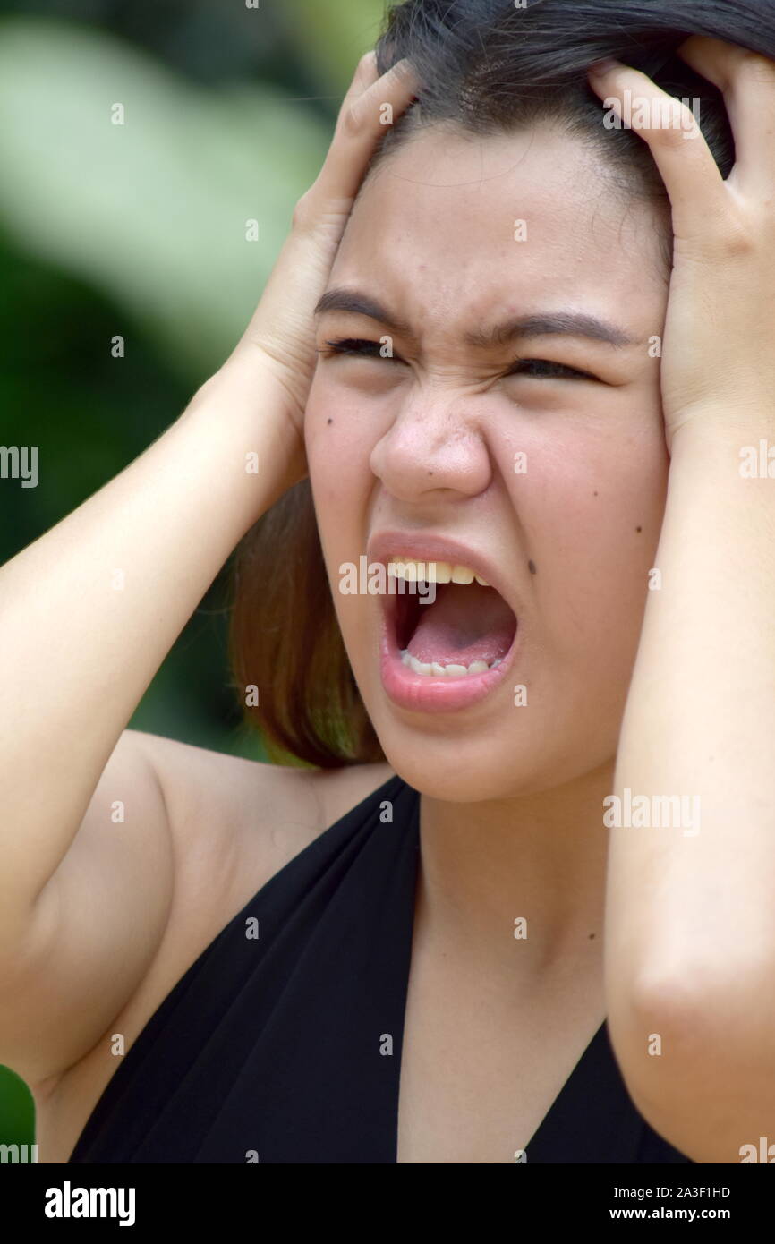 An Anxious Female Woman Stock Photo - Alamy