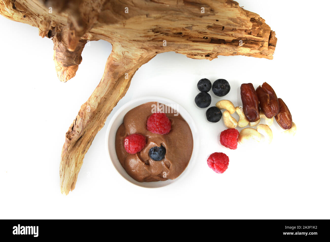Fuite and mousse on flat wood and white background. A breakfast ready ...