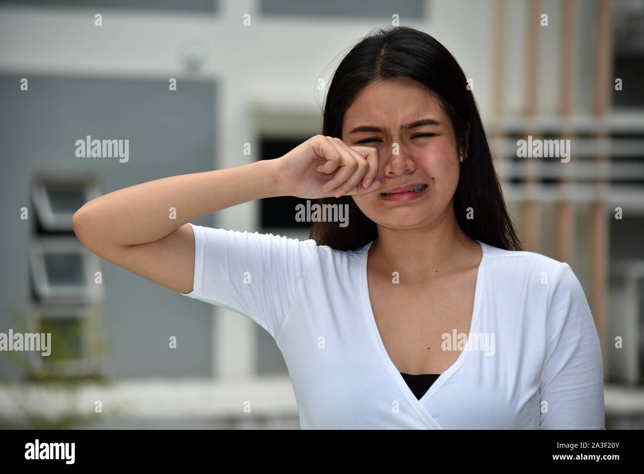 Weeping woman looks hi-res stock photography and images - Alamy