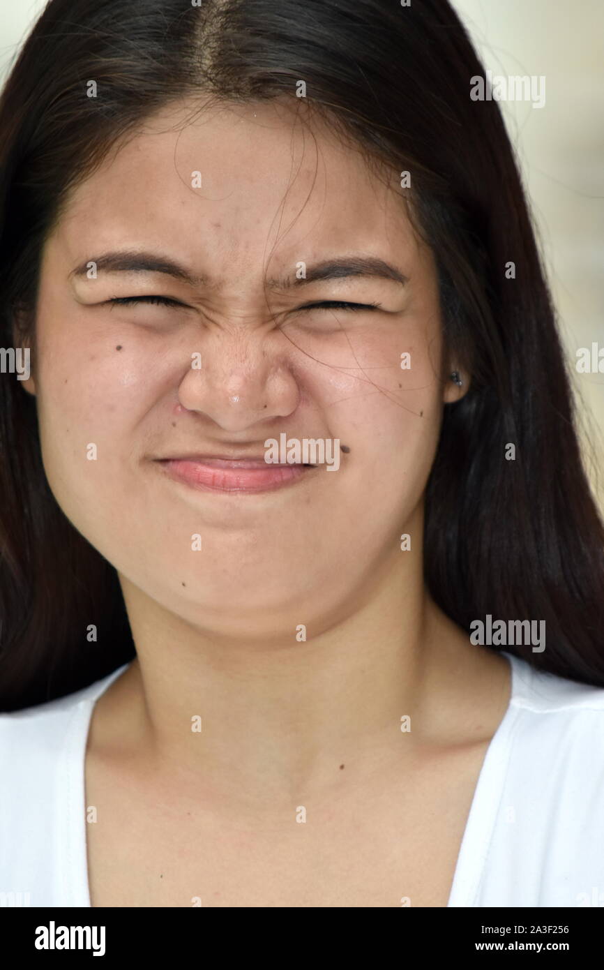 An Anxious Youthful Asian Female Stock Photo - Alamy