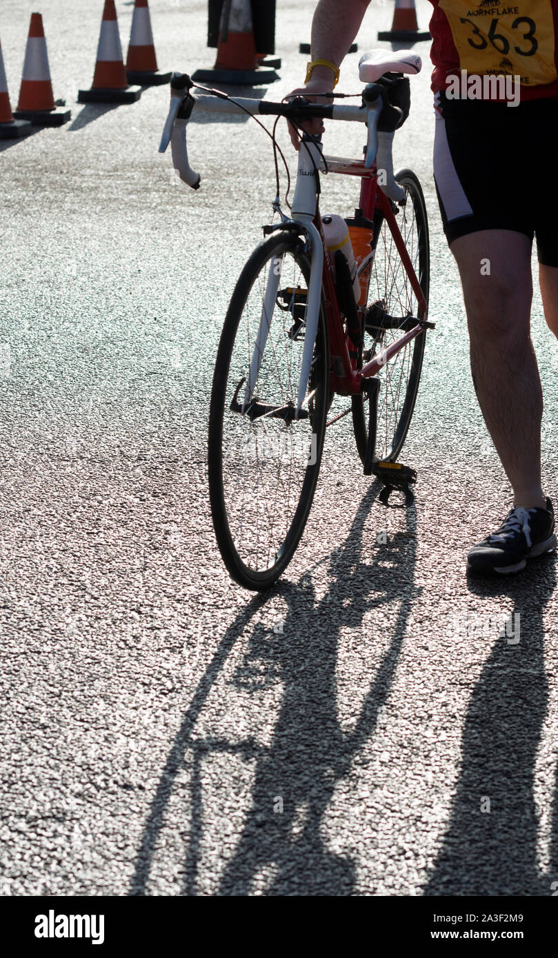 Pushing bike bicycle hi-res stock photography and images - Alamy