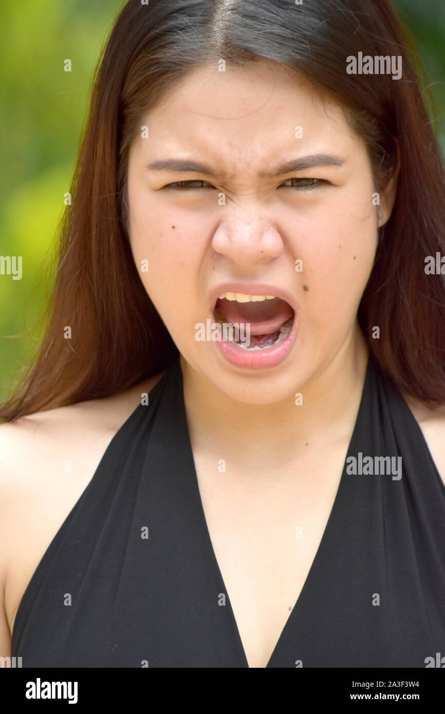 A Young Filipina Female And Anxiety Stock Photo - Alamy