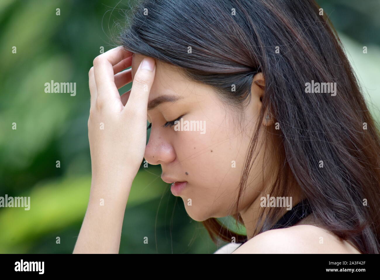 A Worried Beautiful Diverse Female Stock Photo - Alamy