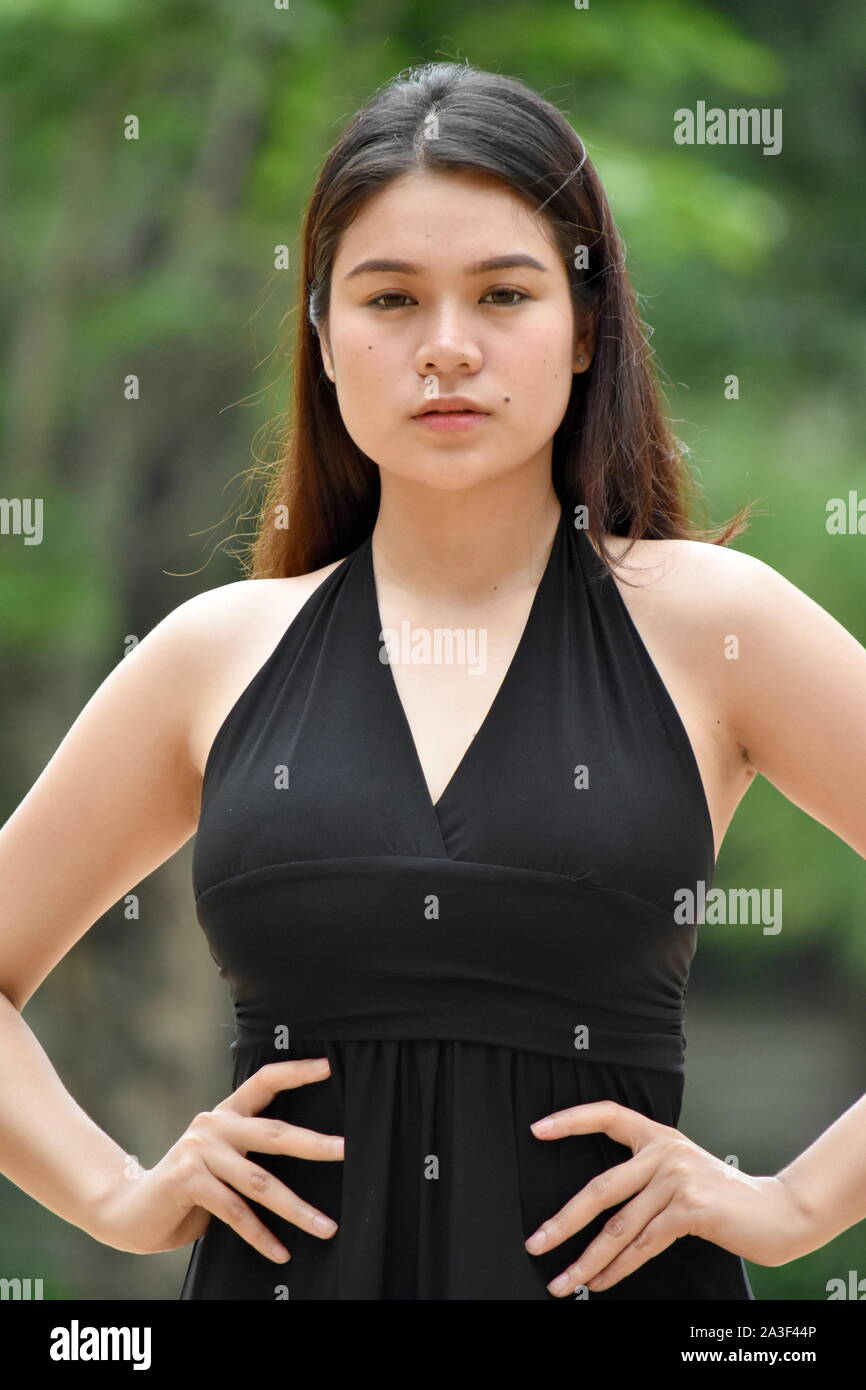 A Confident Attractive Asian Person Stock Photo - Alamy