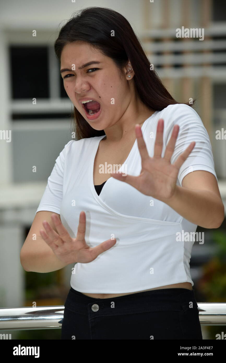 A Fearful Attractive Asian Person Stock Photo - Alamy