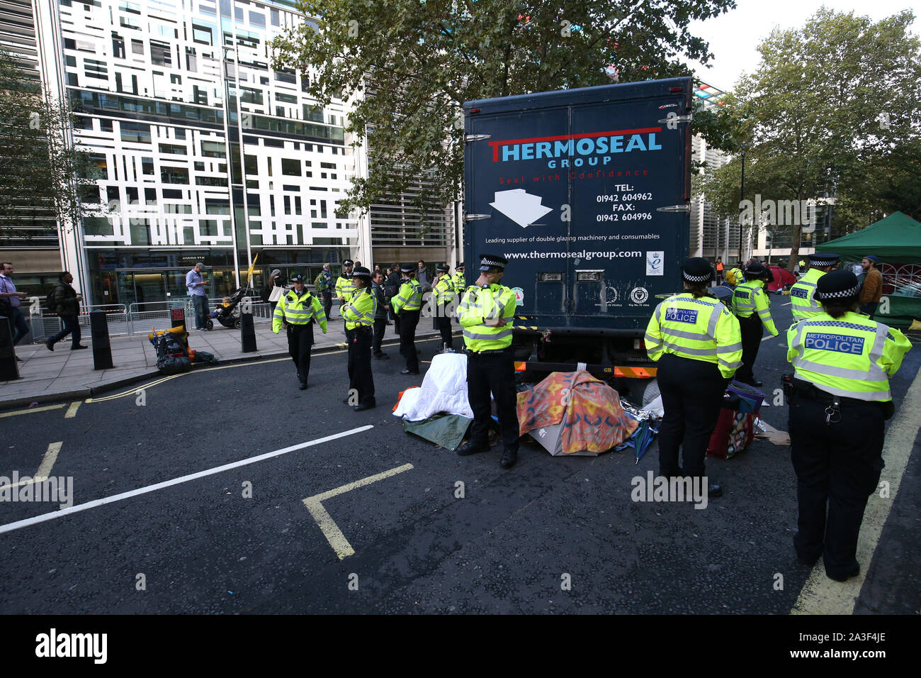 A lorry blocks Marsham Street, outside the entrance to the Home Office ...