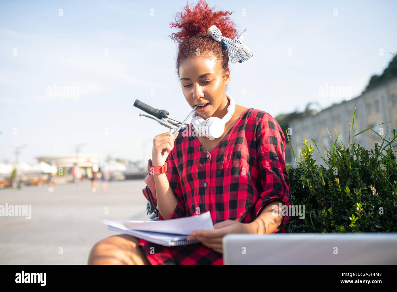 Student feeling thoughtful while preparing for complex test Stock Photo ...