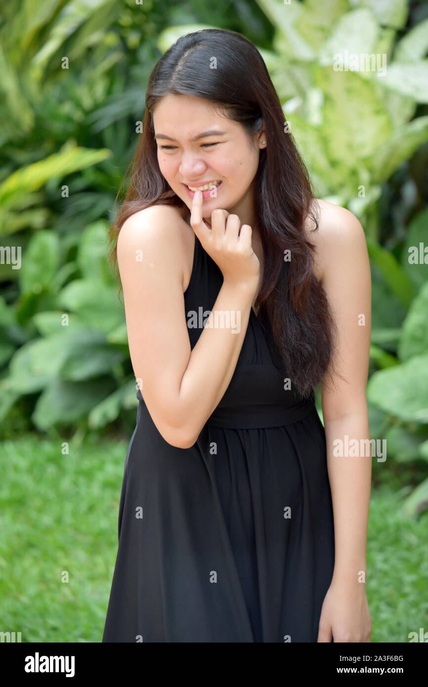 Thoughtful asian woman hi-res stock photography and images - Alamy