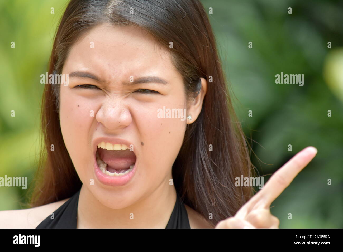 A Mad Adult Female Stock Photo - Alamy