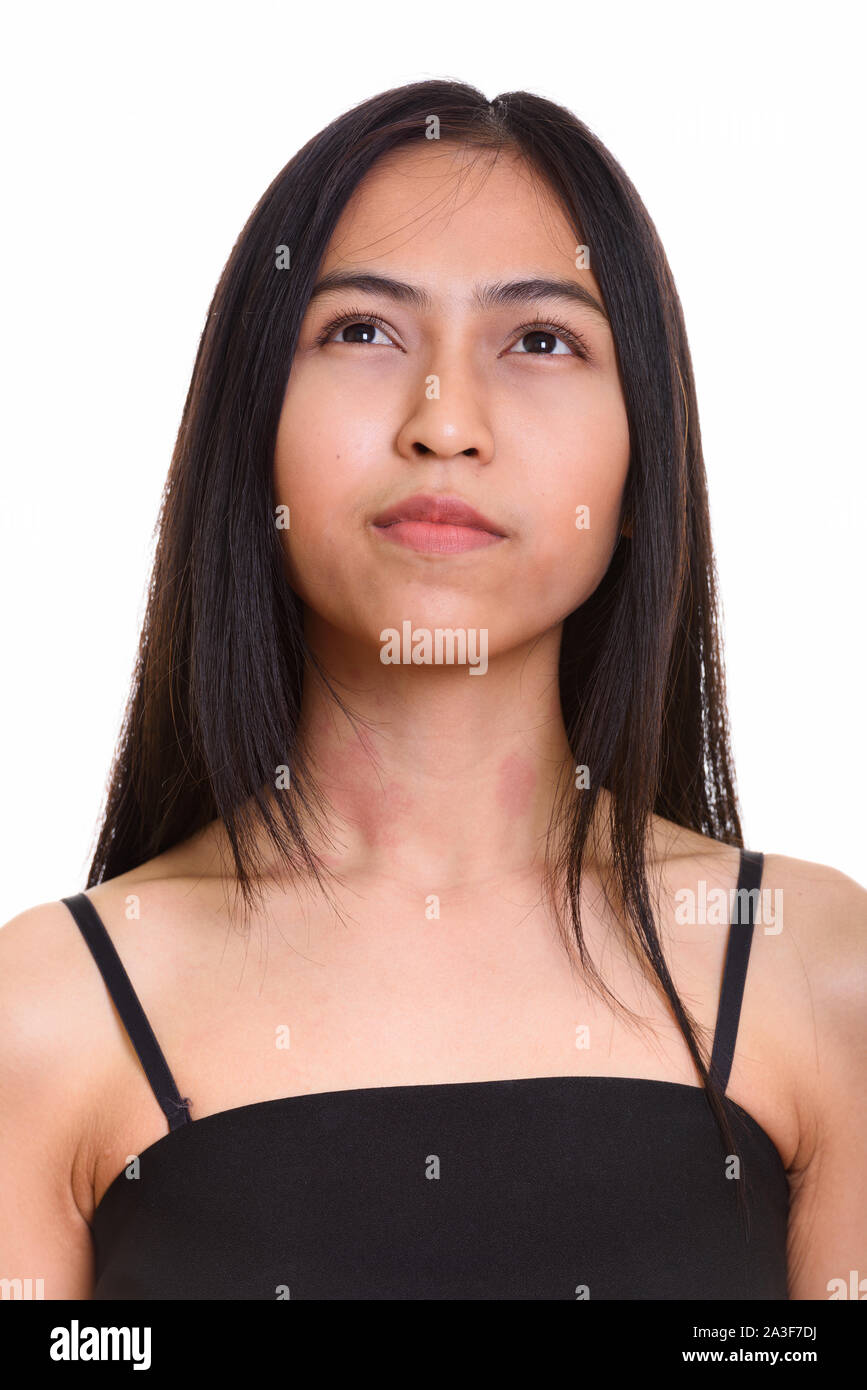 Face of young Asian teenage girl thinking Stock Photo - Alamy