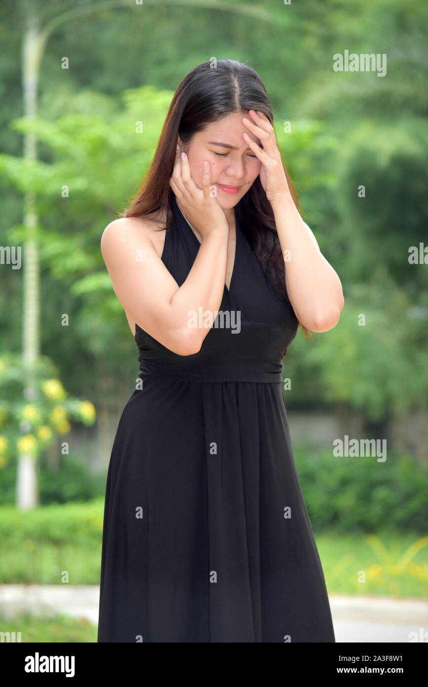 An Attractive Asian Female And Anxiety Stock Photo - Alamy