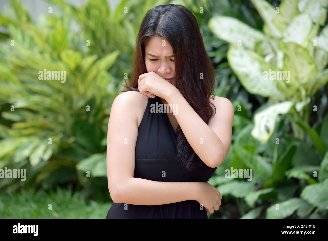 A Crying Beautiful Minority Person Stock Photo - Alamy