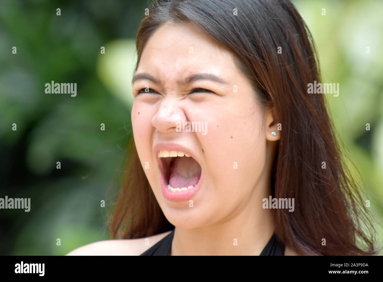 An Angry Adult Female Stock Photo - Alamy