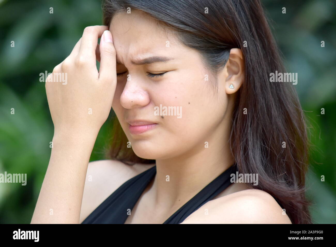 An Asian Female And Worry Stock Photo - Alamy