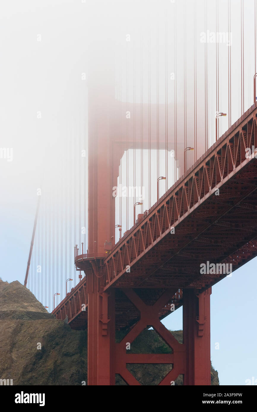The Golden Gate bridge disappearing into the mist in San Francisco ...