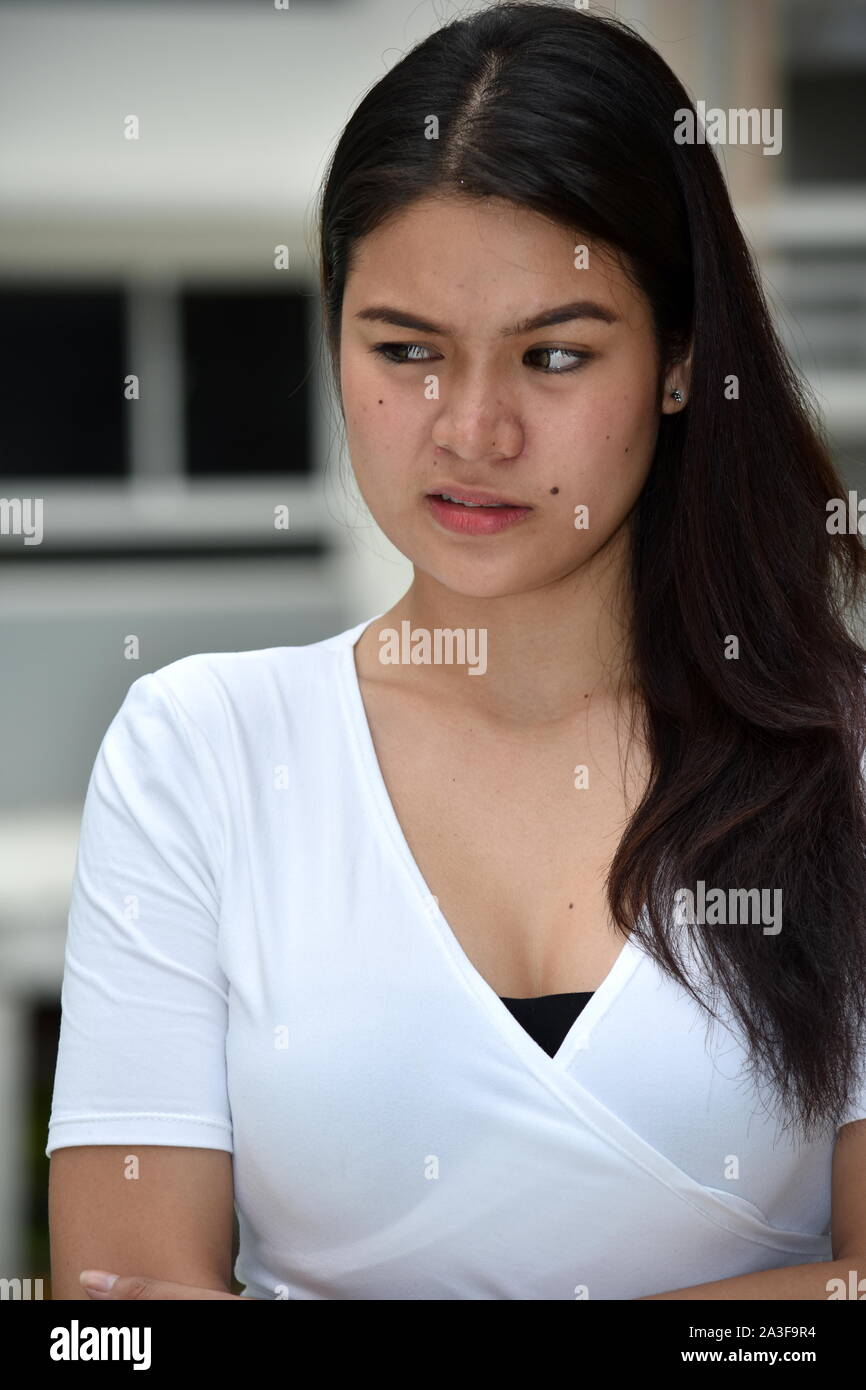 A Suspicious Pretty Person Stock Photo - Alamy