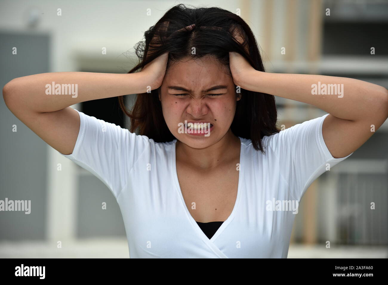 A Young Asian Female And Anxiety Stock Photo - Alamy