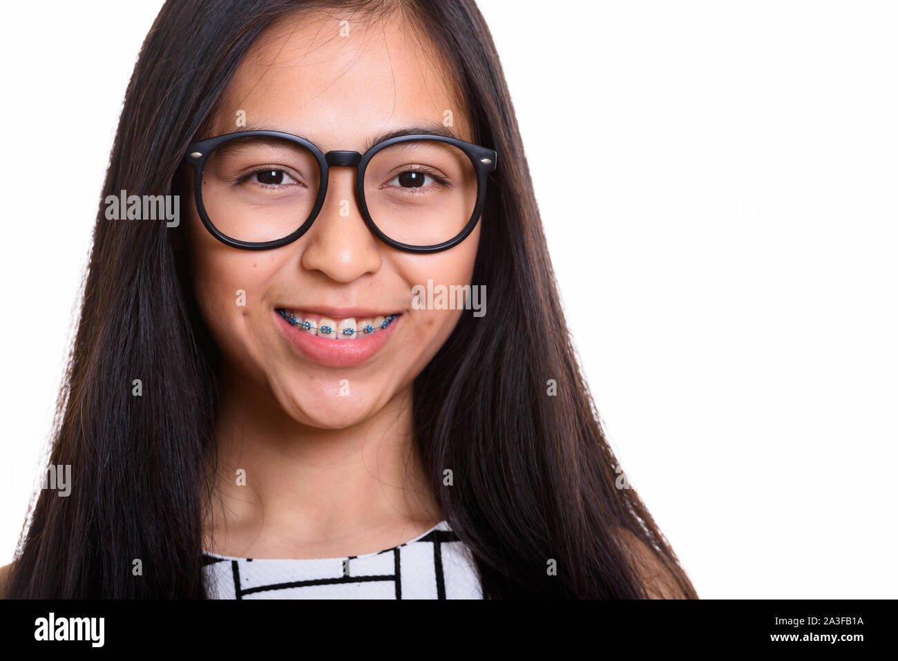 Young happy Asian teenage nerd girl smiling Stock Photo - Alamy