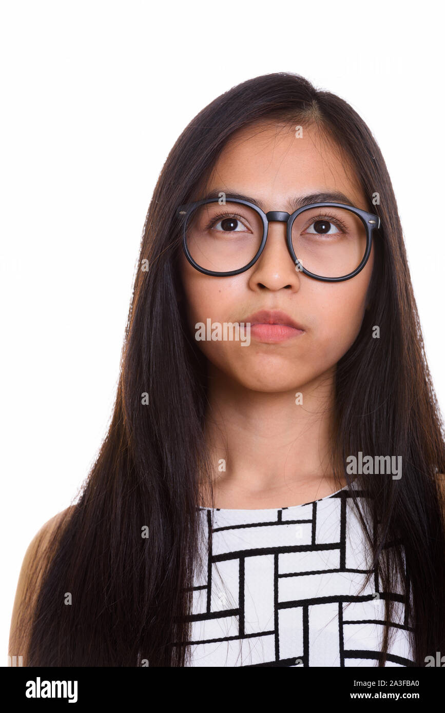 Face of young Asian teenage nerd girl thinking Stock Photo - Alamy