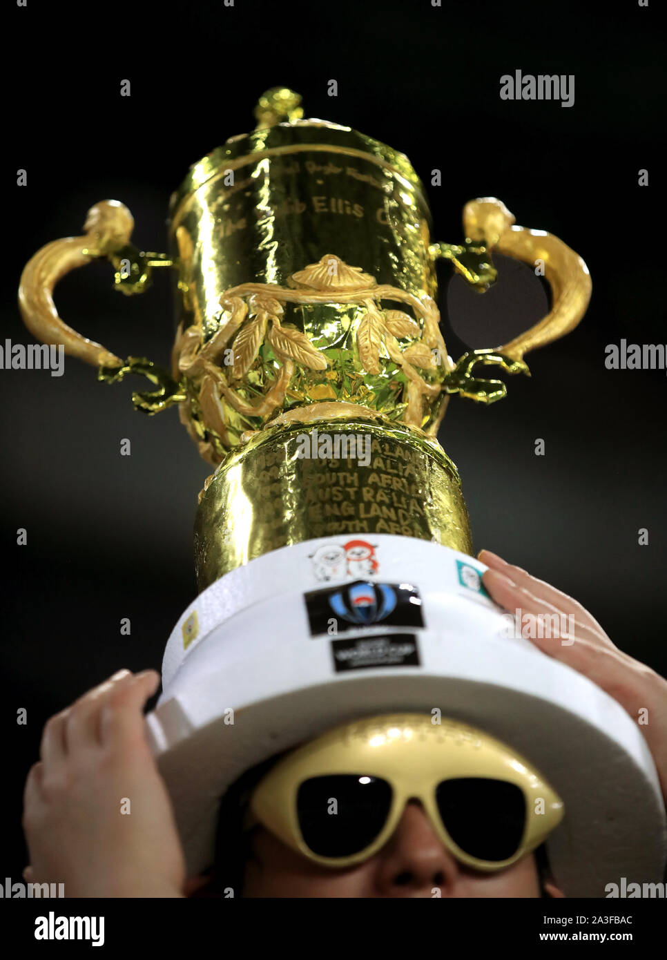 A fan shows their support with a Webb Ellis Cup hat ahead of the 2019 ...