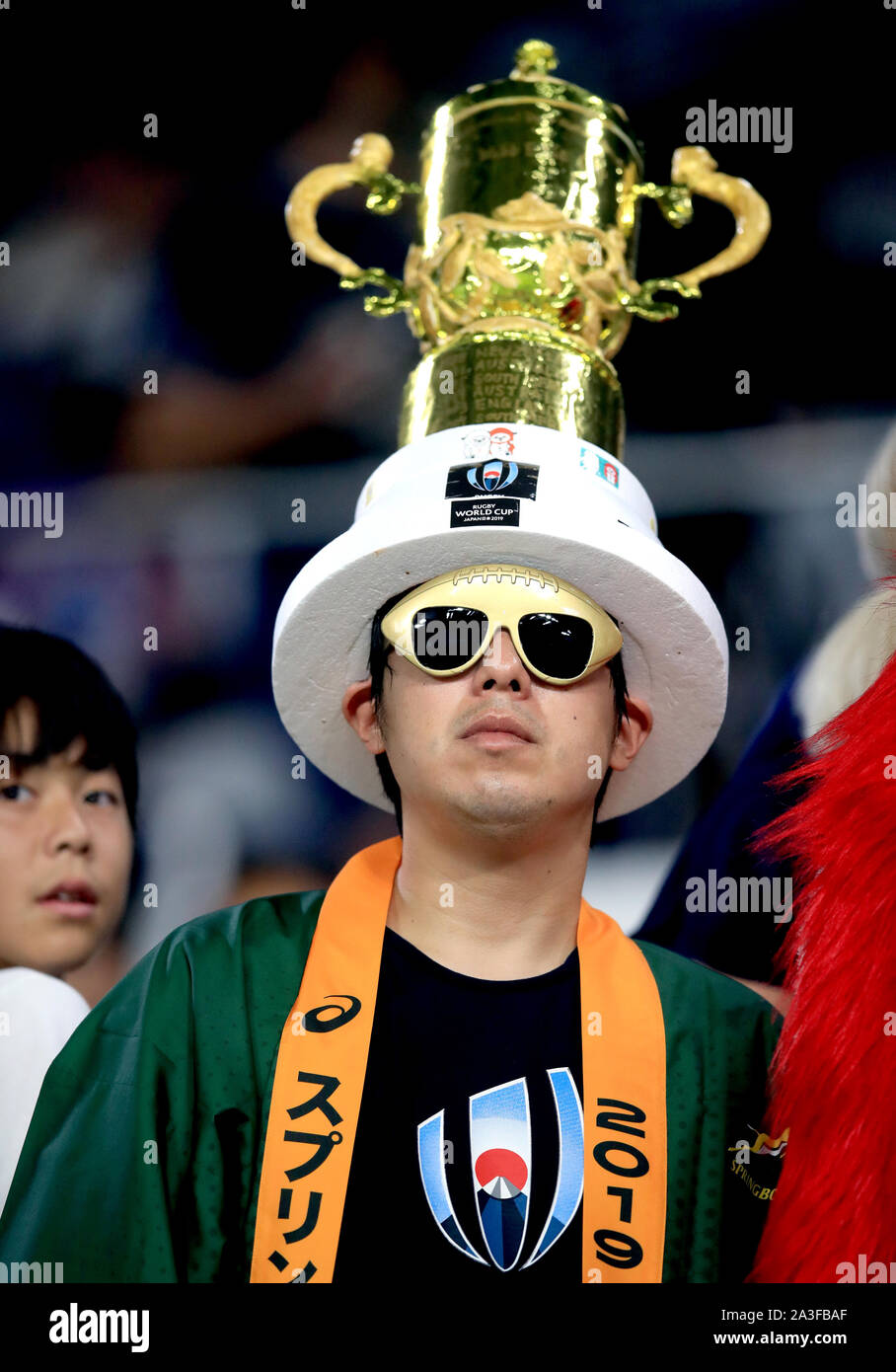 A fan shows their support with a Webb Ellis Cup hat ahead of the 2019 ...