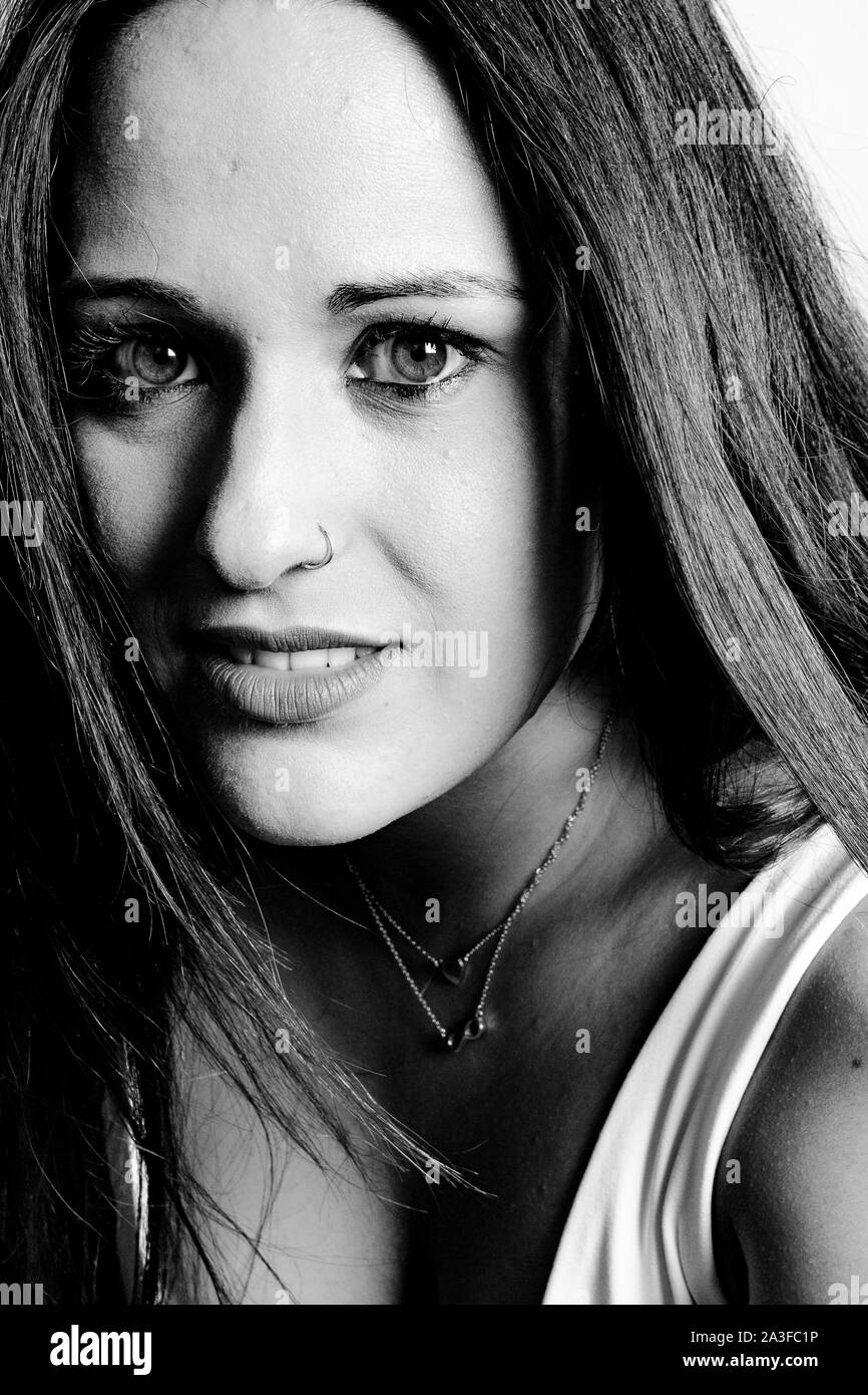 studio lighting portrait of a young woman with expressive eyes Stock ...