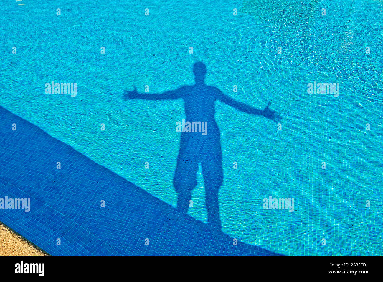 Textured water in swimming pool and hard shadow silhouette Stock Photo ...