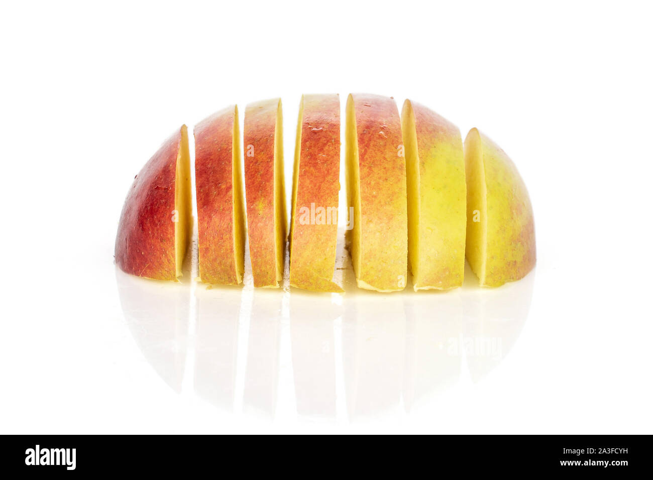 Group of seven slices of arranged red apple jonagold isolated on white ...