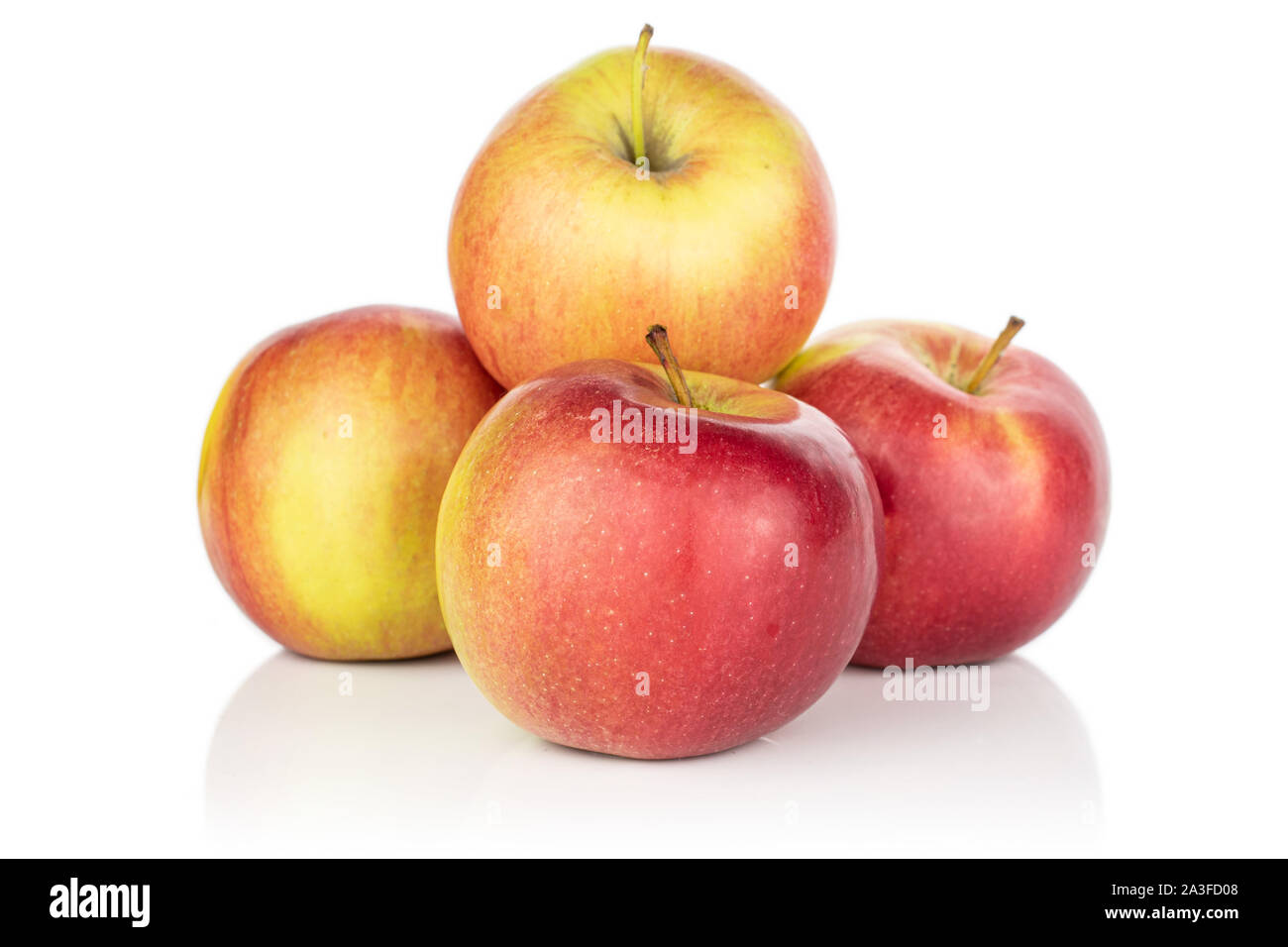 Group of four whole red apple jonagold isolated on white background ...