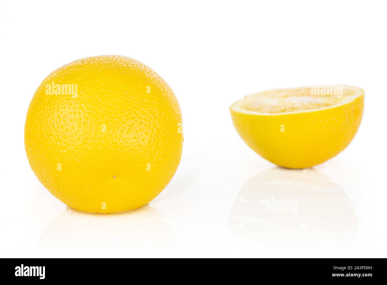 Group of one whole one half of fresh bright orange isolated on white ...