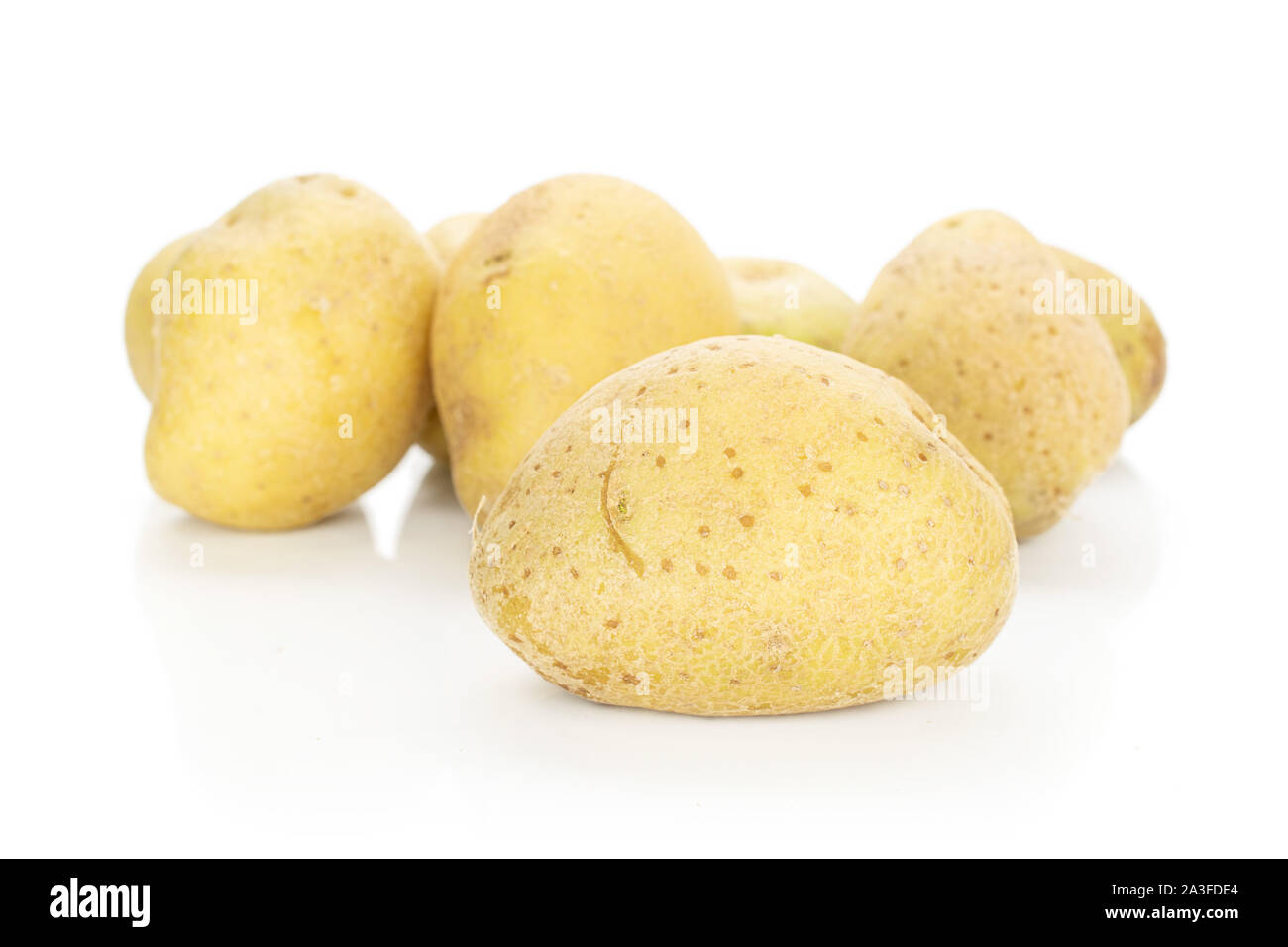 Group of six whole raw brown potato isolated on white background Stock ...