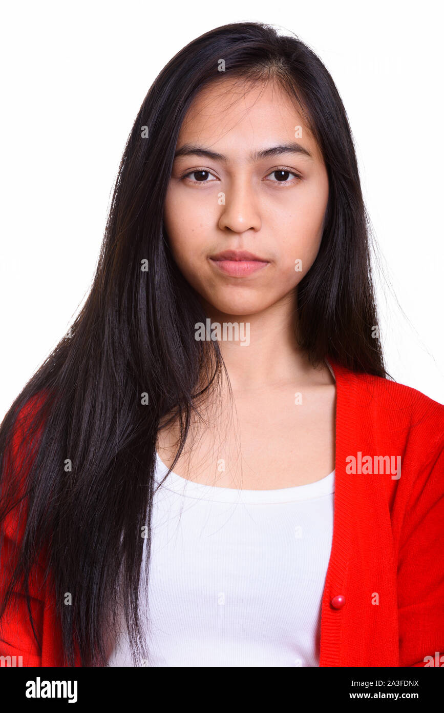 Face of young Asian teenage girl looking at camera Stock Photo - Alamy