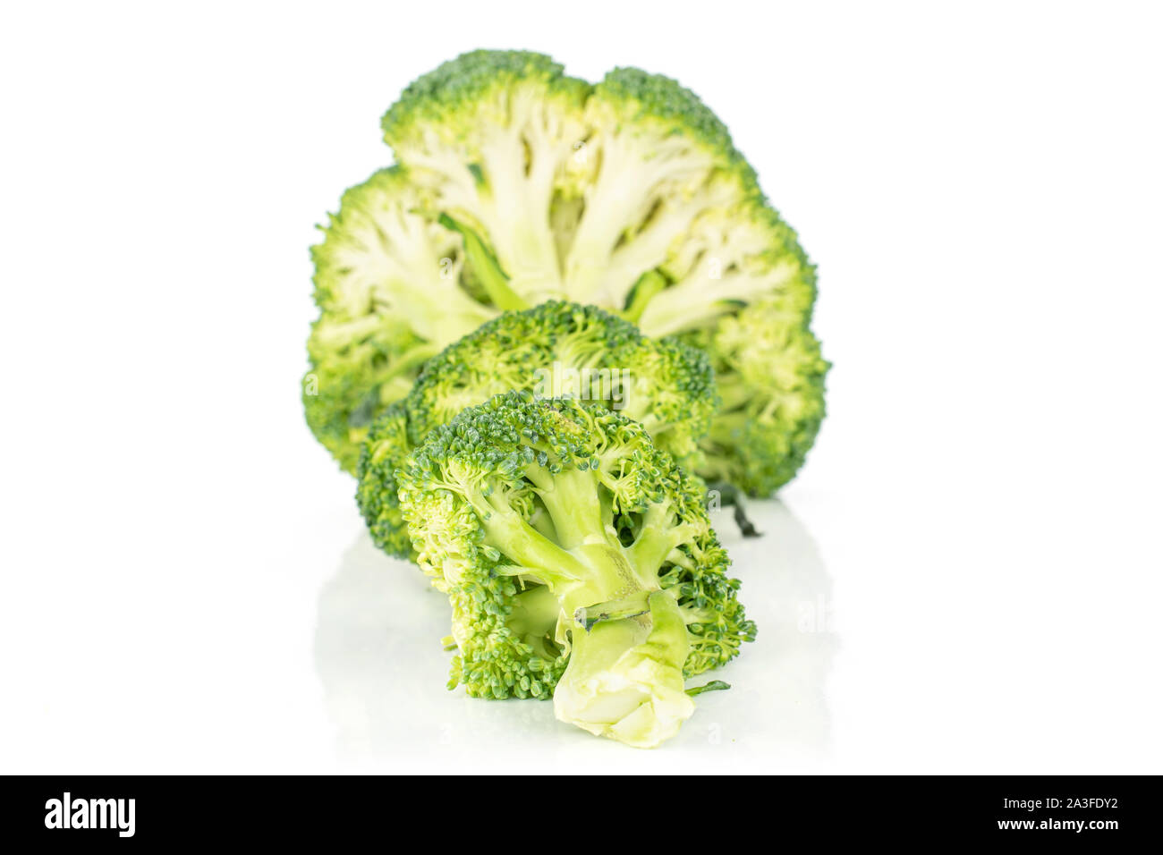 Group of one whole one piece of fresh green broccoli isolated on white ...