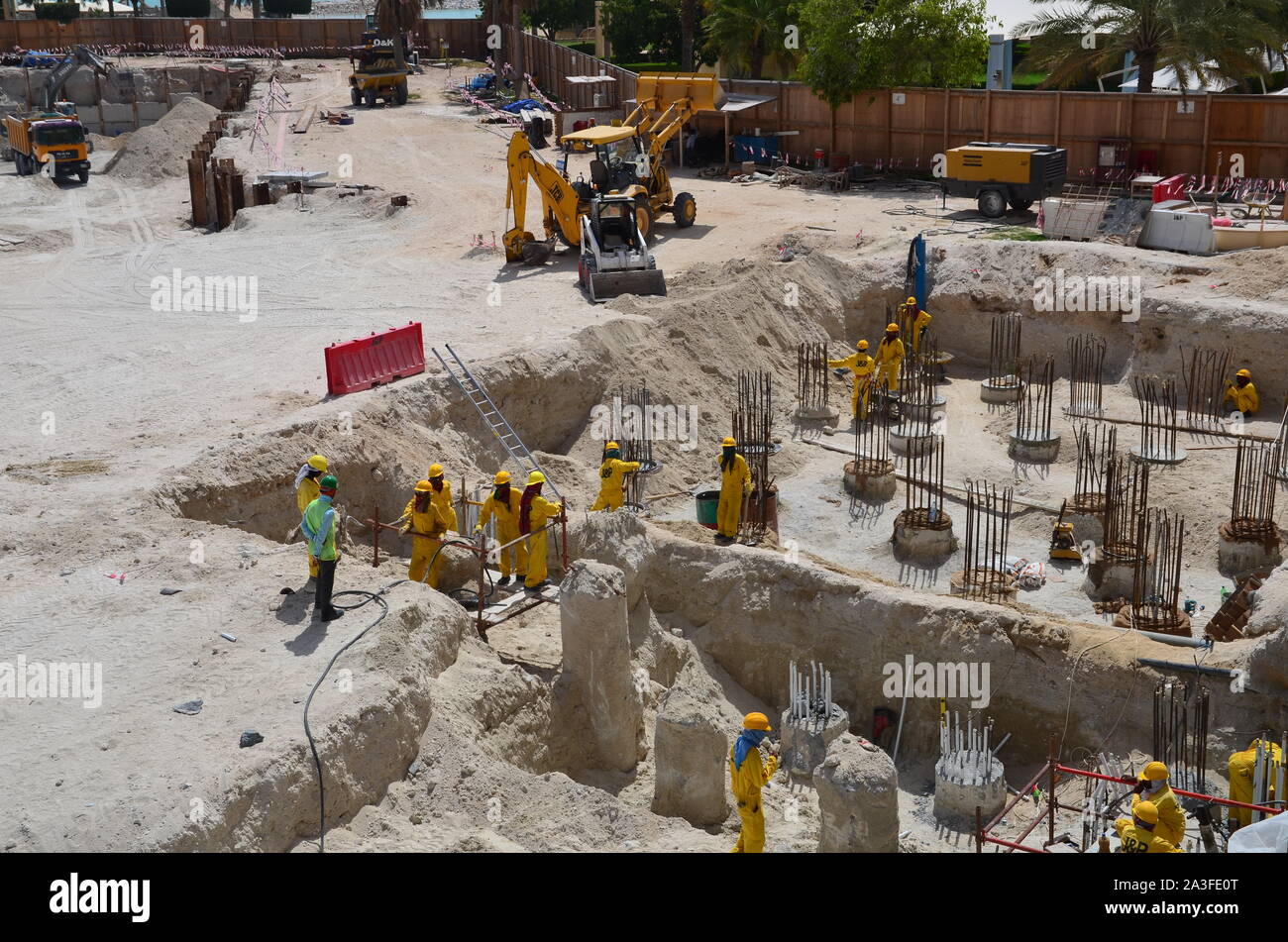 Foreign building workers, Doha, Qatar Stock Photo - Alamy
