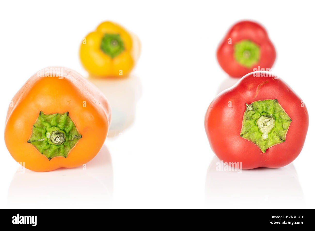 Group of four whole fresh pepper isolated on white background Stock ...