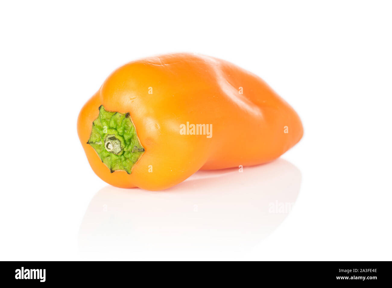 One whole fresh pepper isolated on white background Stock Photo - Alamy
